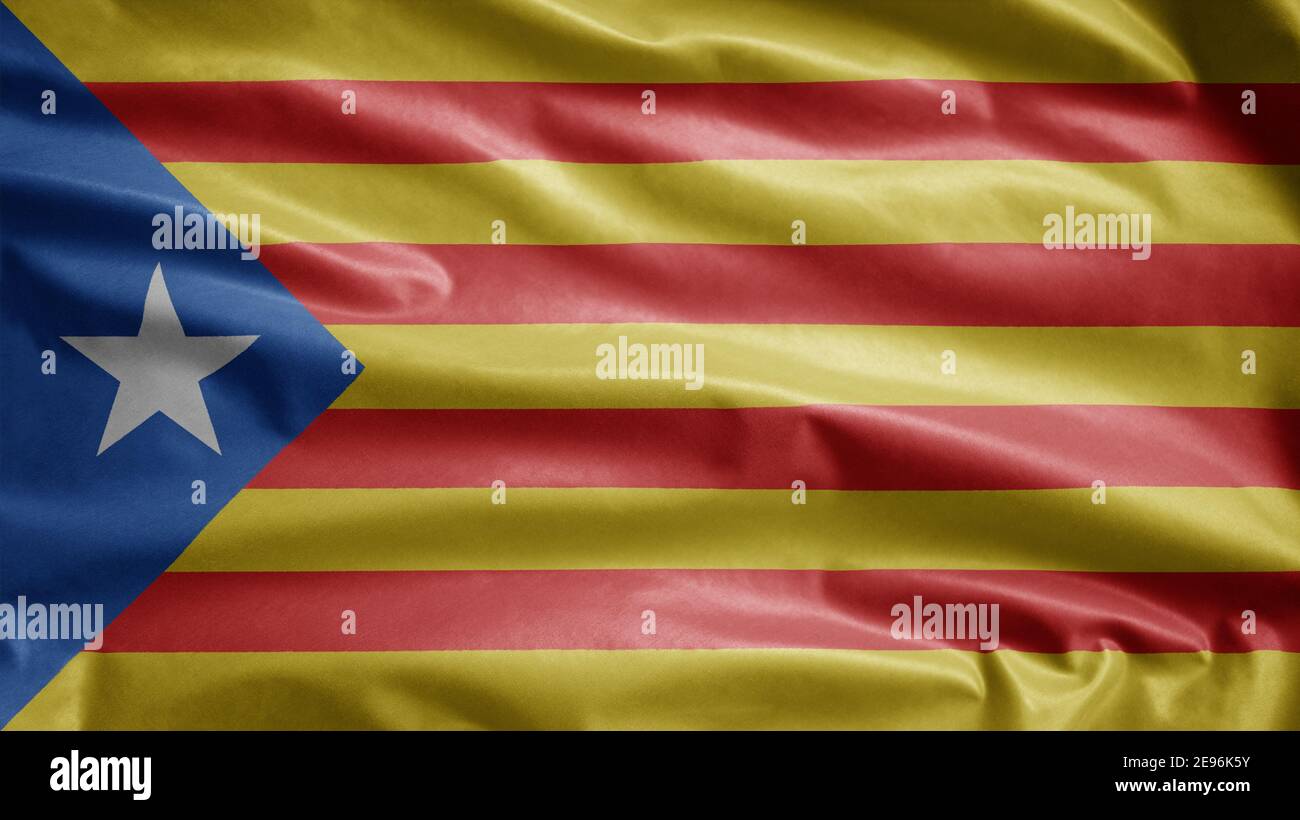 Catalonia independent flag waving in wind. Closeup Catalan estelada ...