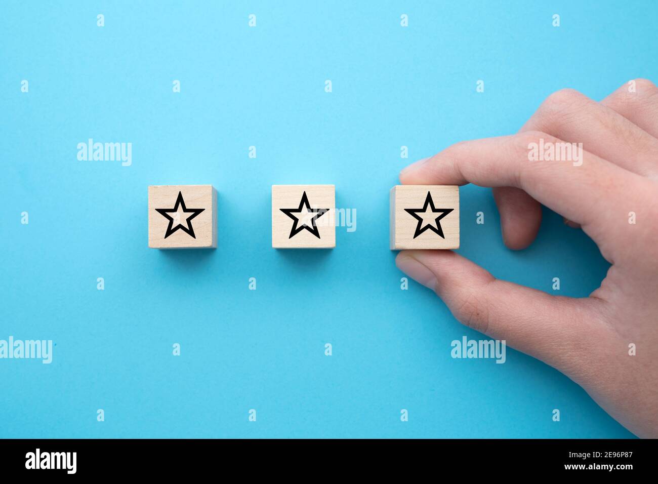 Customer satisfaction survery with three stars rating Stock Photo - Alamy