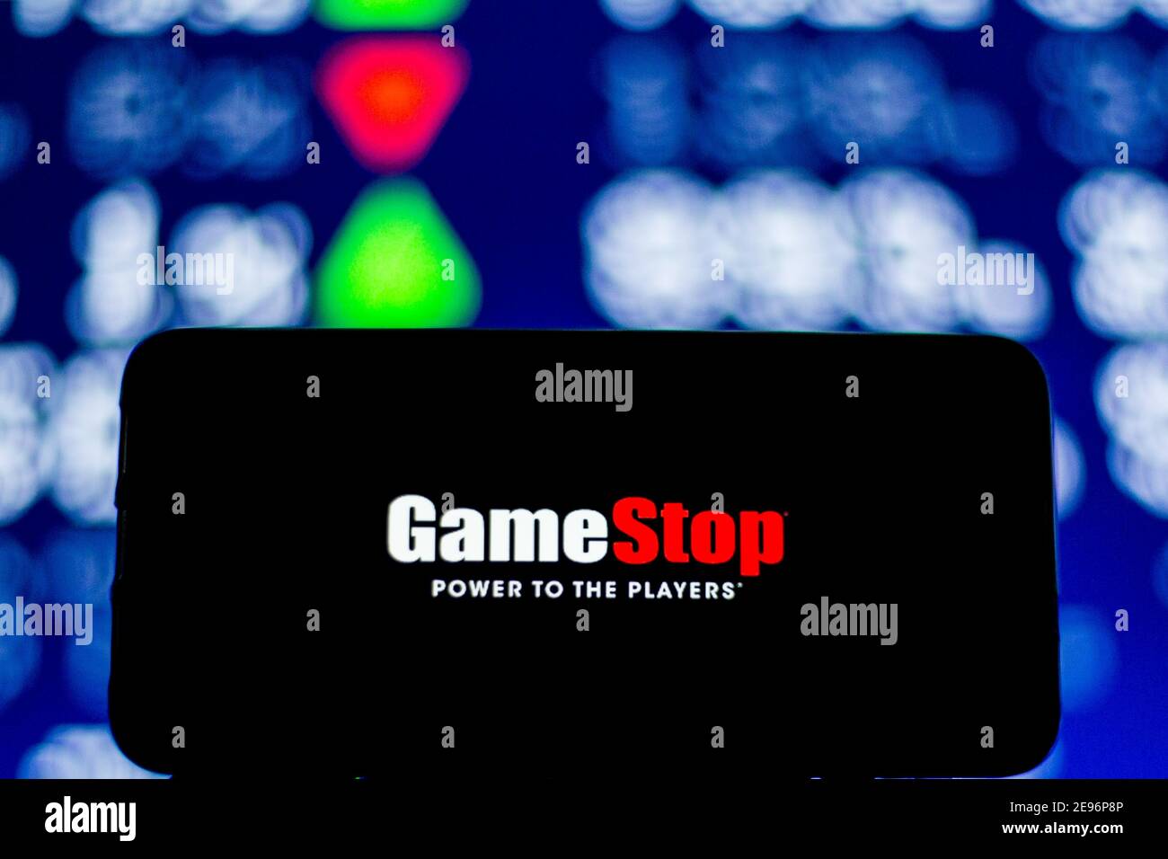 In this photo illustration a GameStop logo is seen displayed on a ...