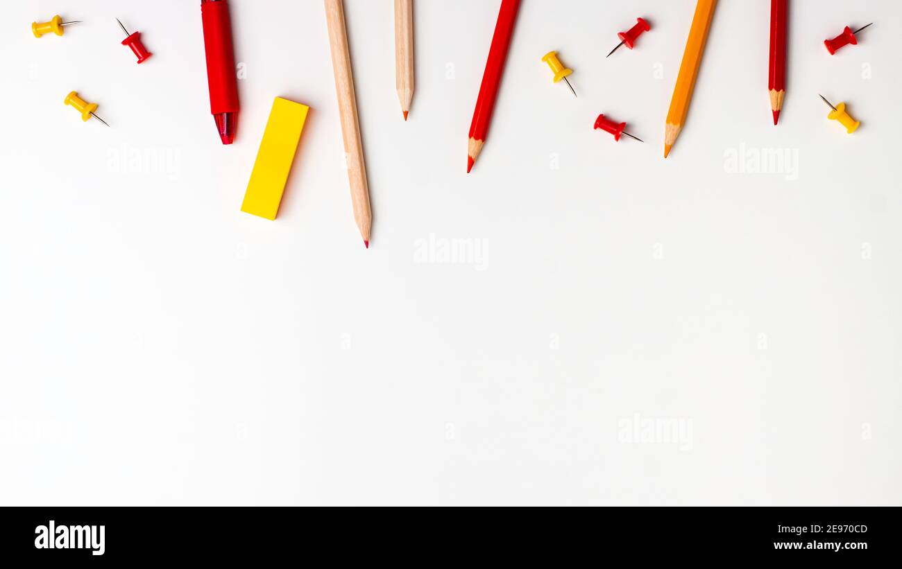 Red and yellow pen, sticky note, notepad, marker, eraser, push pins ...