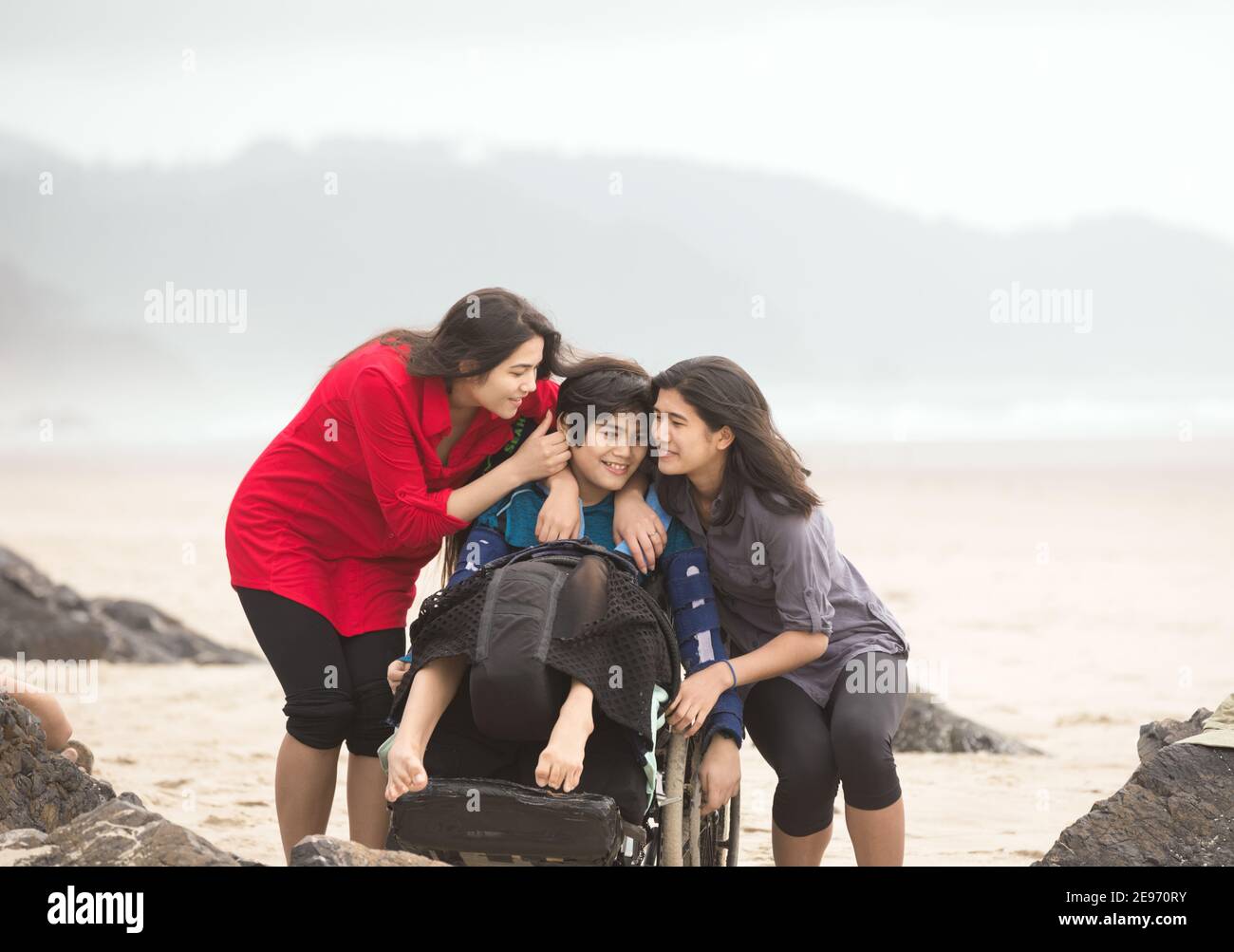 Family hugging disabled hi-res stock photography and images - Alamy