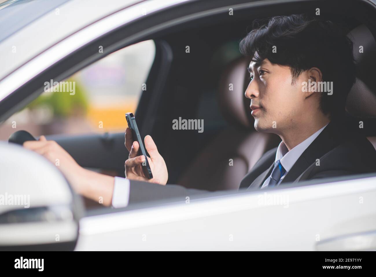 Car driving phone asia hi-res stock photography and images - Alamy