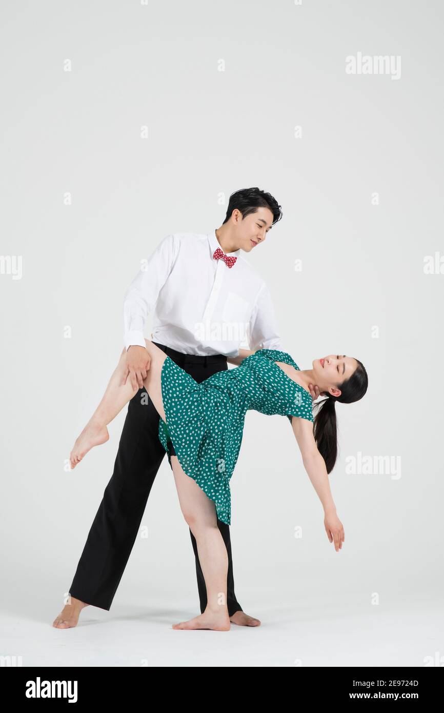 retro concept, contemporary couple dancer in white background Stock ...