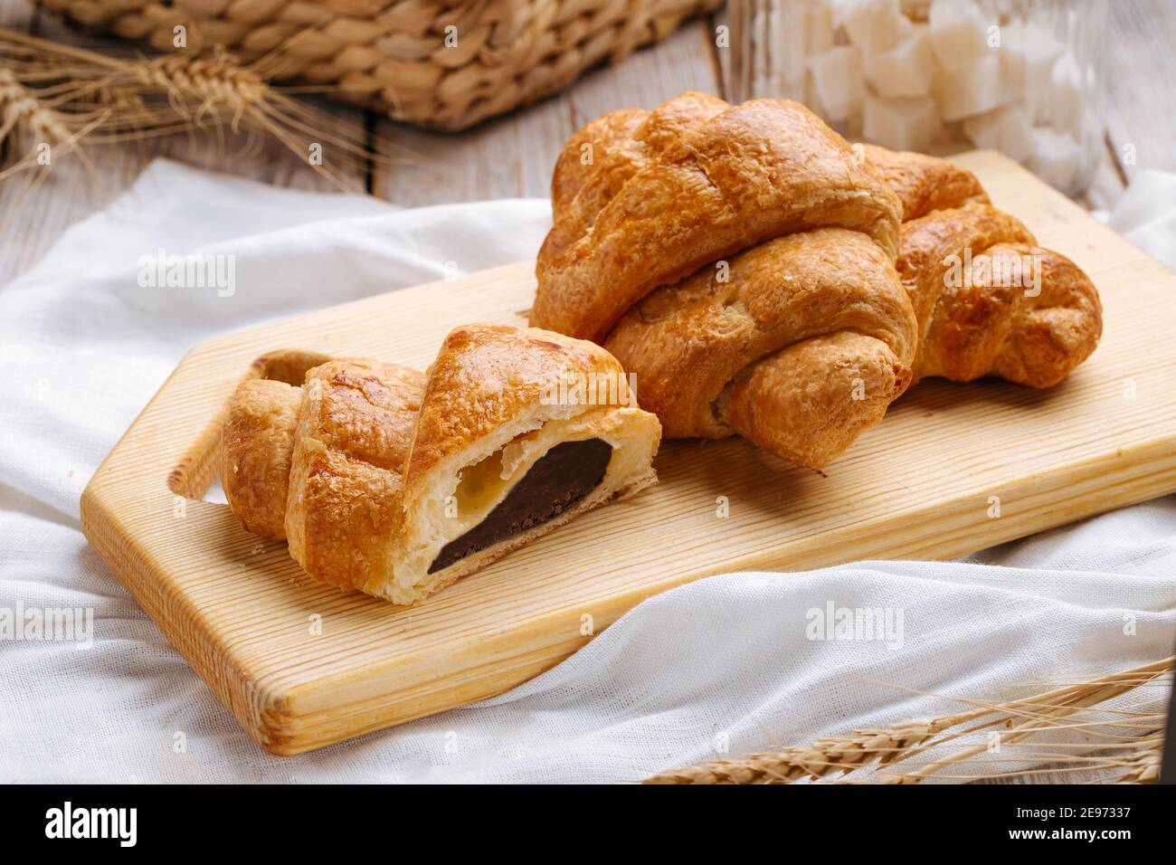 Closeup on french croissant with chocolate filling Stock Photo - Alamy