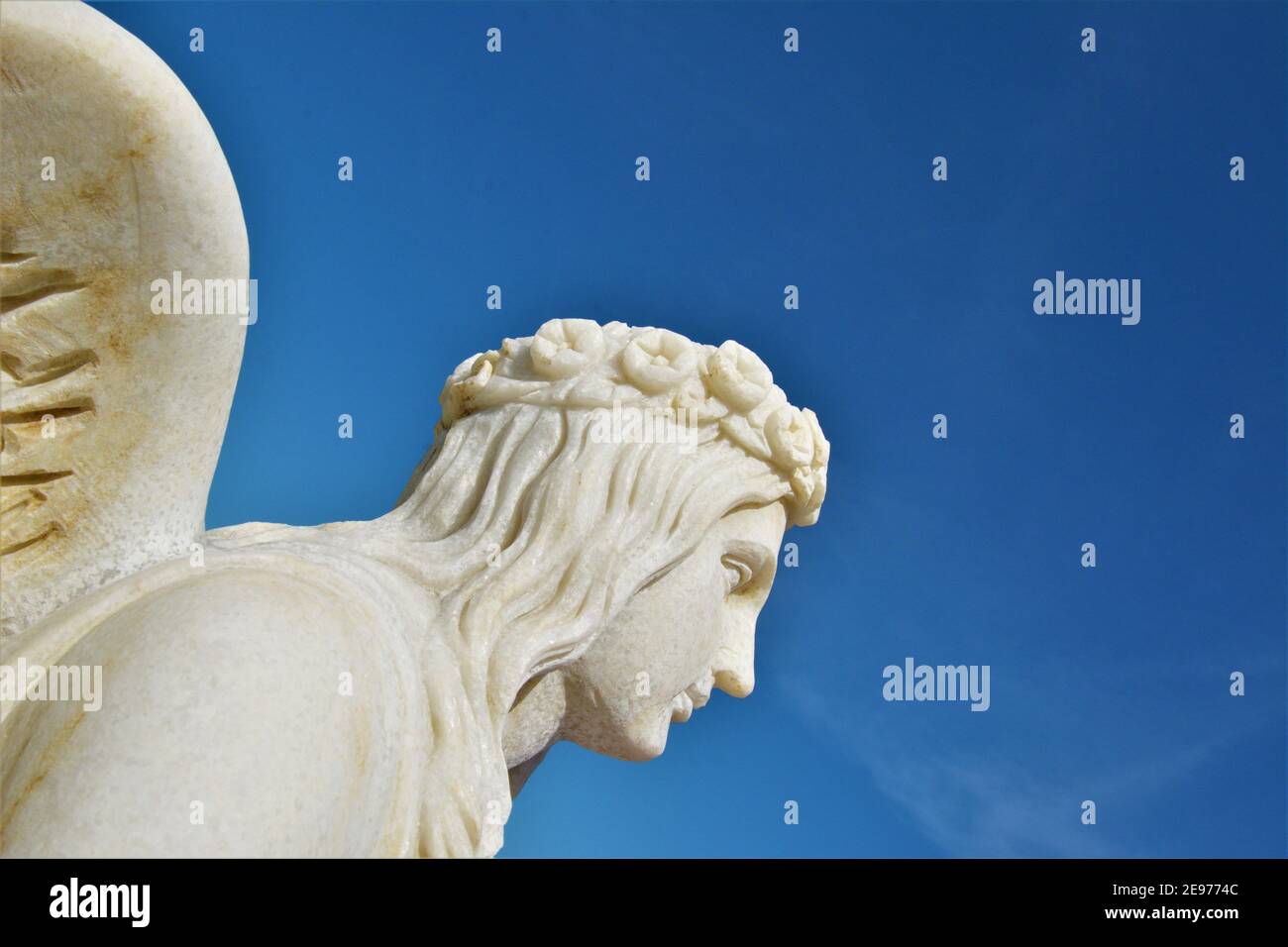 Angel statues in a California Catholic public cemetery with open sky ...