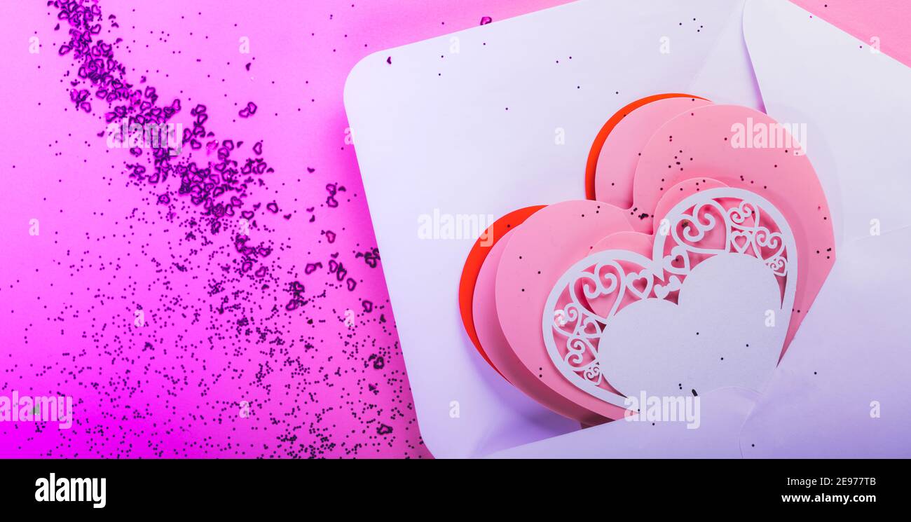 Handmade Love letter, envelope with paper craft hearts on background ...