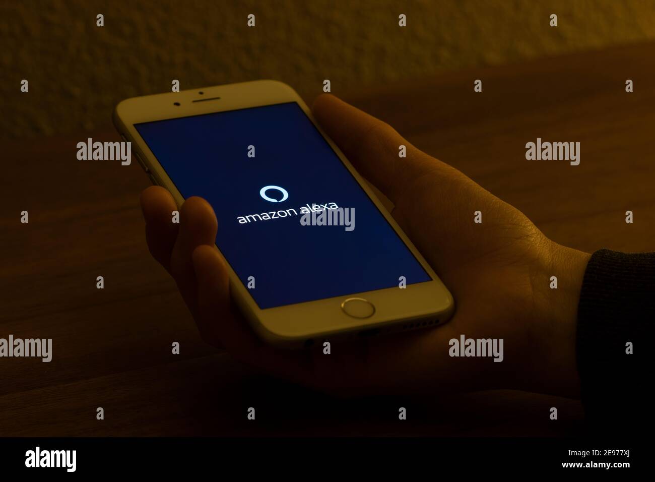 A woman launches the Amazon Alexa app from her iPhone on Feb 2, 2021. Amazon Alexa, also known ...