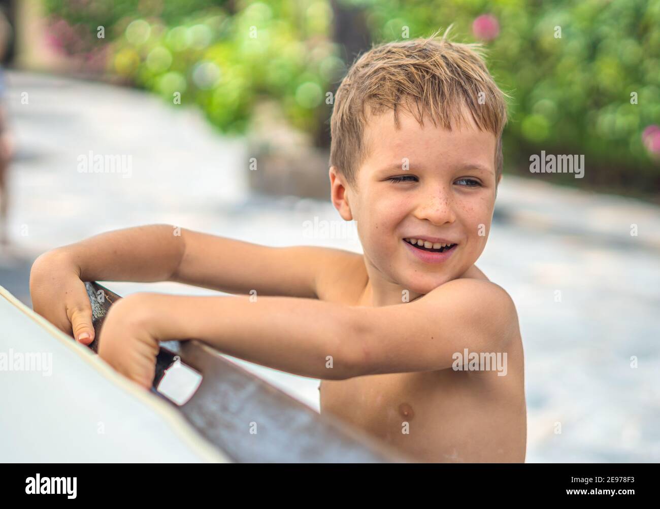 Side portrait mischievous boy, freckled nose, open mouth intriguing ...