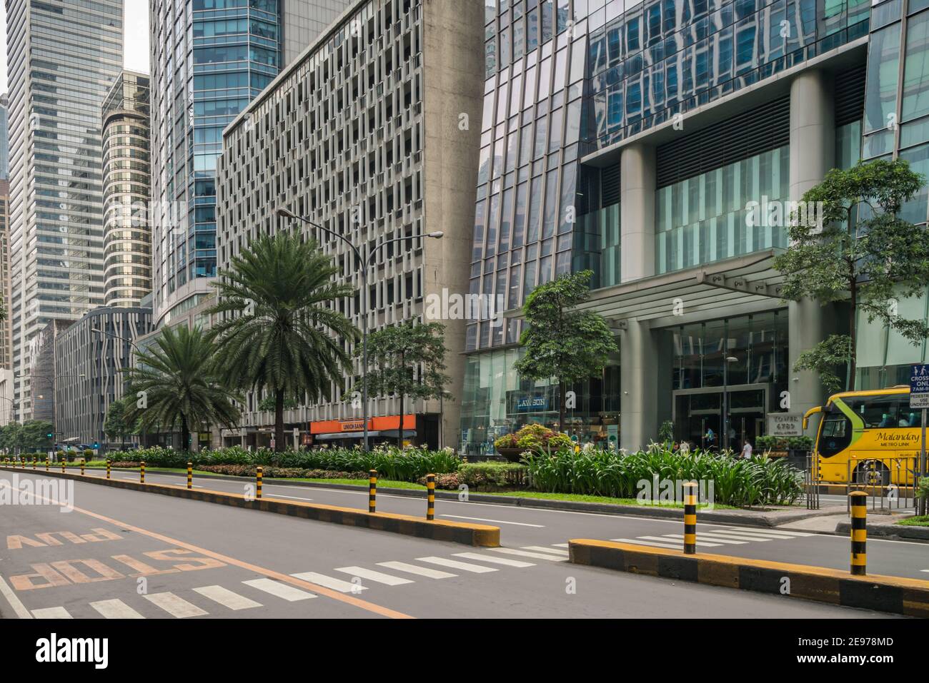 Makati, Metro Manila, Philippines - August 2018: empty street on Ayala Avenue and financial ...