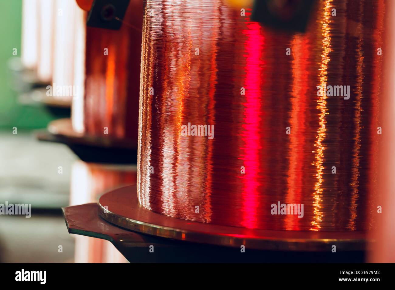 Copper wire reels in cable factory close up Stock Photo - Alamy