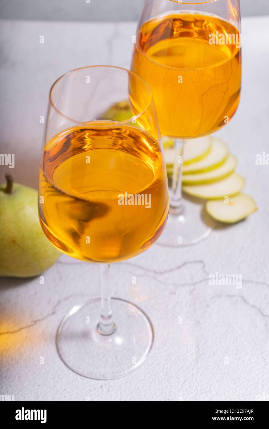 amber or orange wine made from white grapes. in a tall wine glass ...
