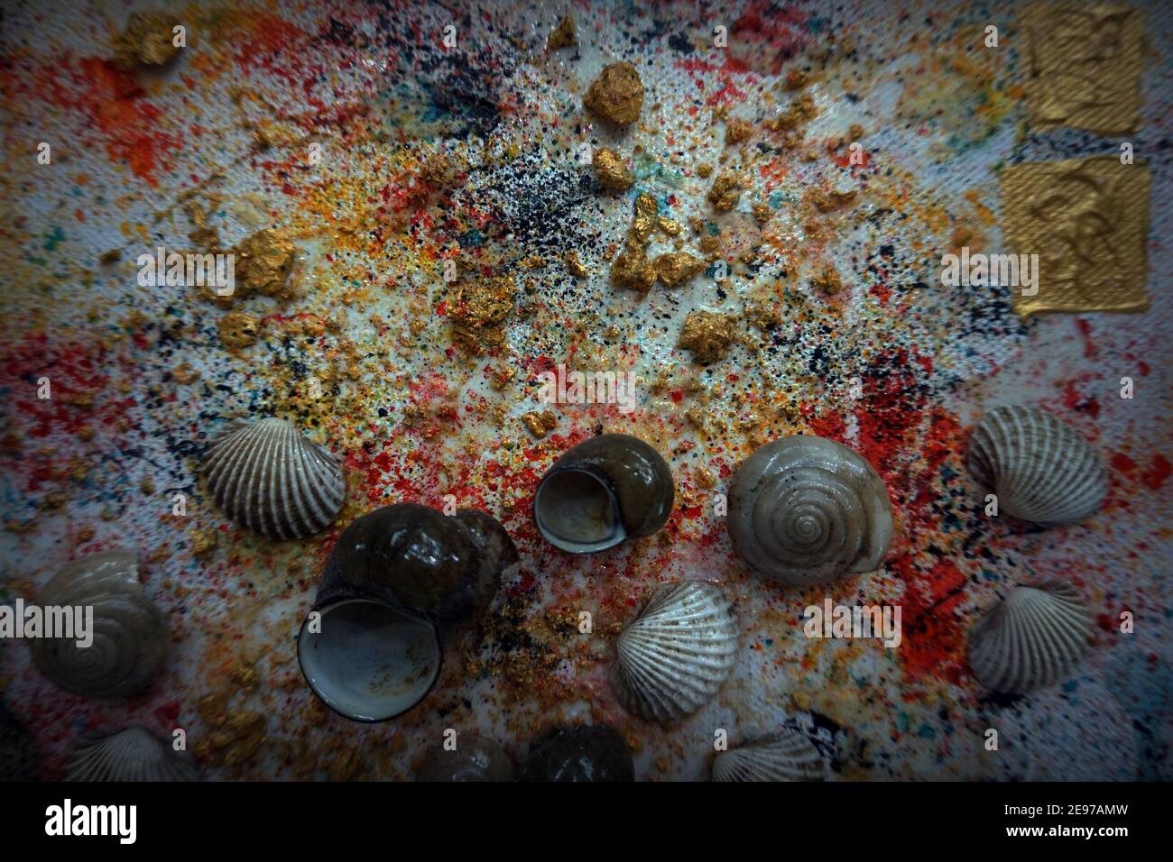 Mixed media art, a variety of shells on the background disappearing ...