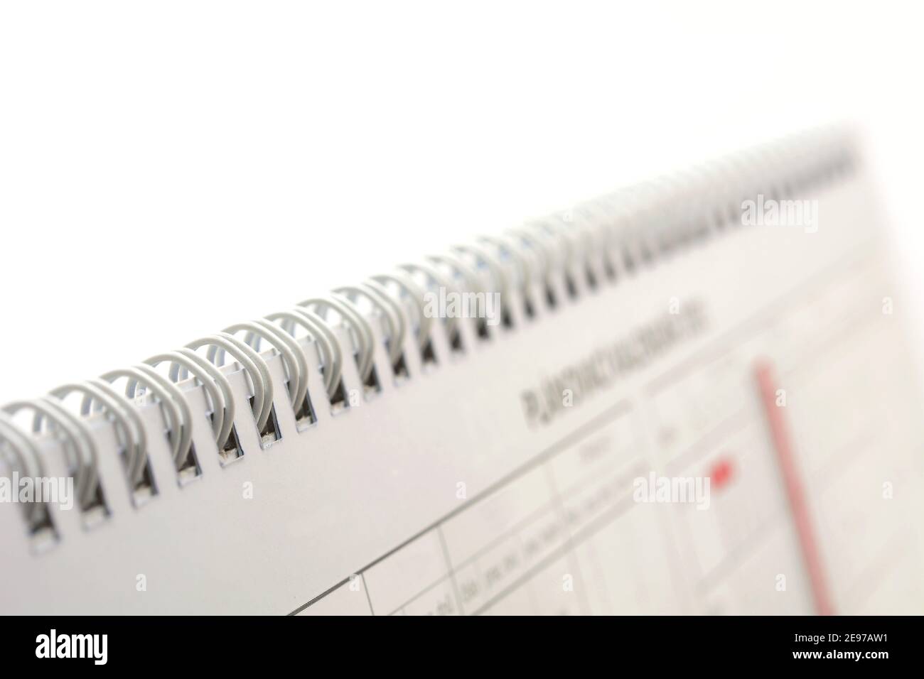 Closeup of a spiral calendar on white background Stock Photo - Alamy