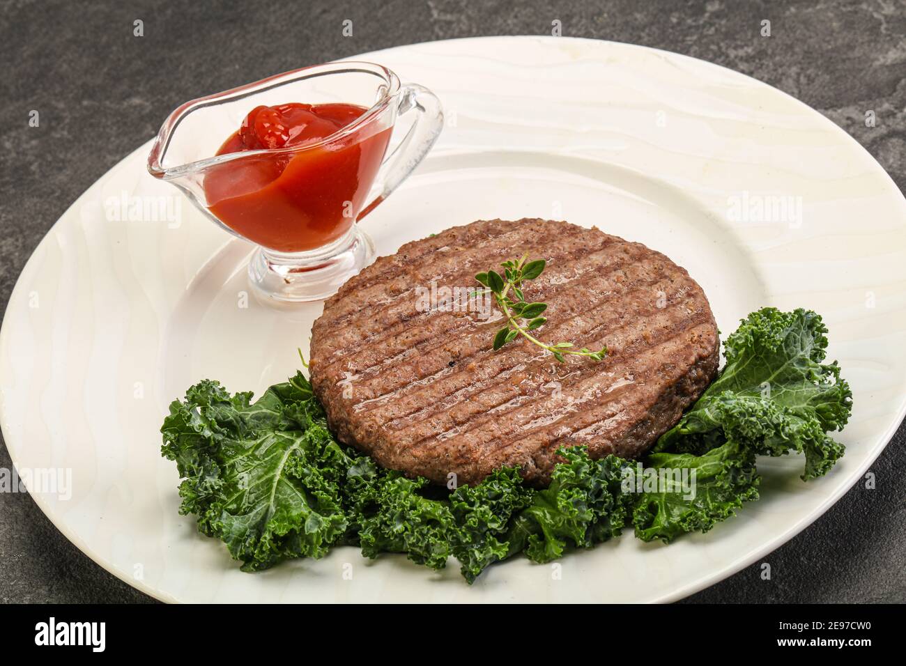 Grilled tasty beef cutlet for burger Stock Photo - Alamy