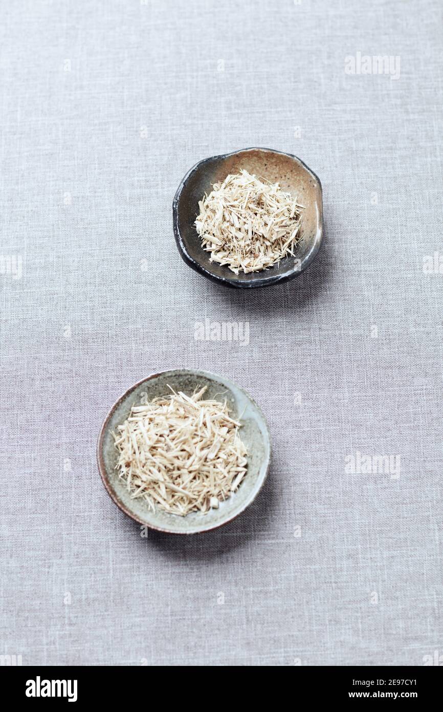 Dry Siberian ginseng (Eleutherococcus senticosus) on linen background ...
