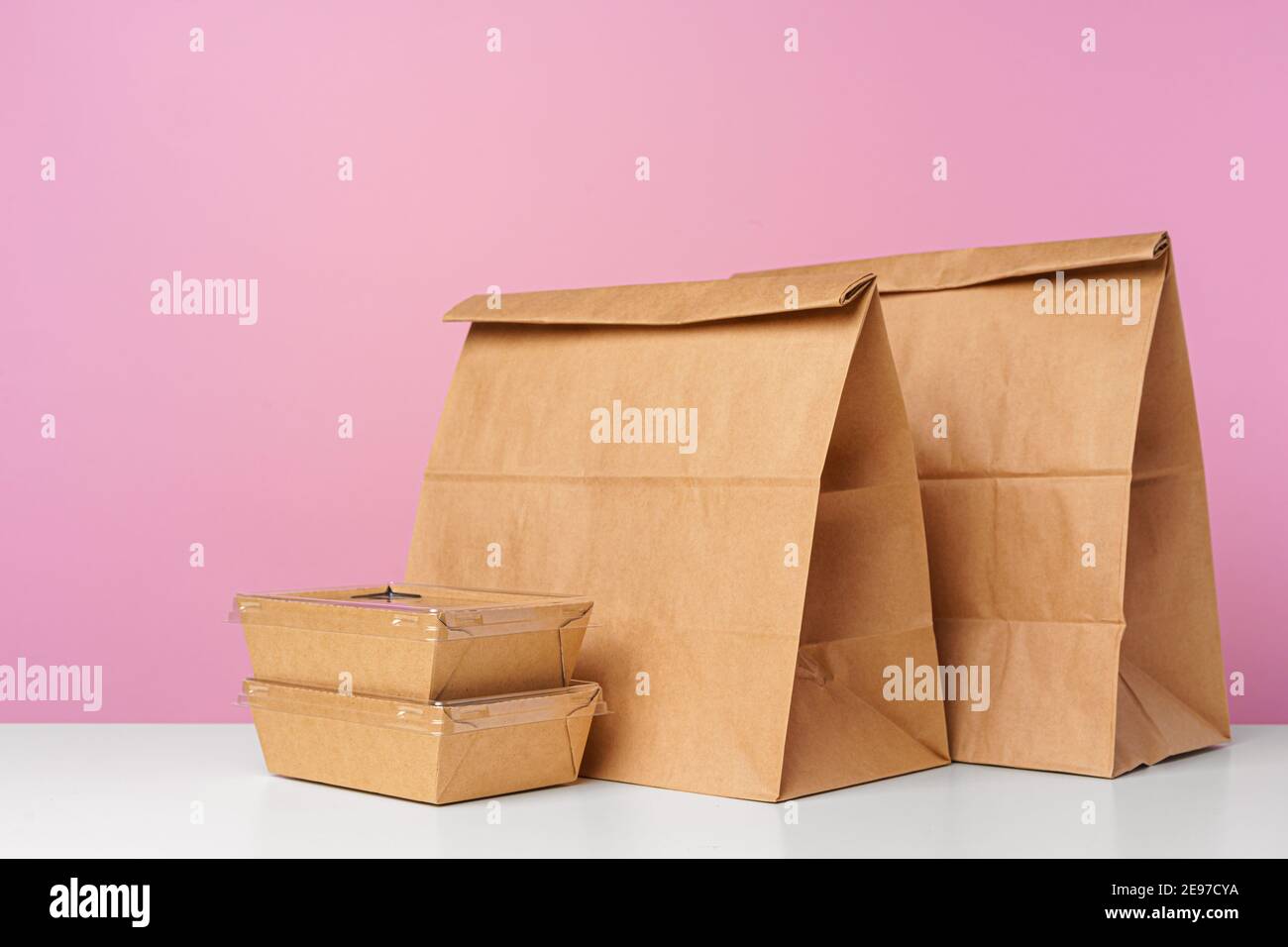 Assortment of various food delivery containers on table Stock Photo - Alamy