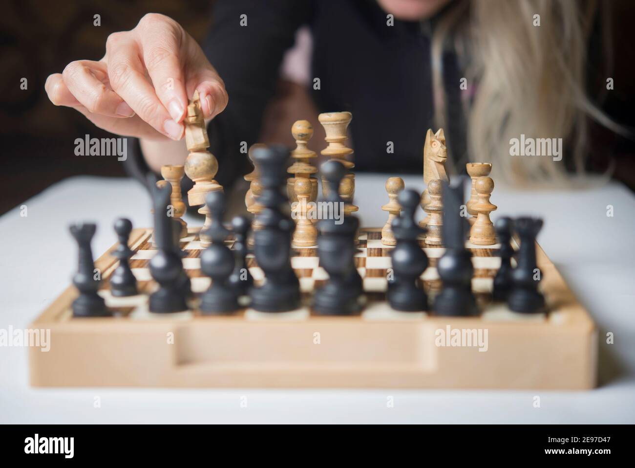 beautiful girl playing chess Stock Photo - Alamy