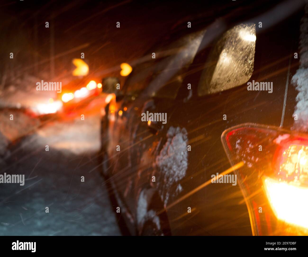 Slippery road leads to car accident in winter storm Stock Photo - Alamy