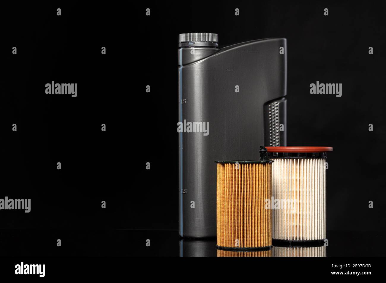 Car oil filters and motor oil can on dark background Stock Photo - Alamy