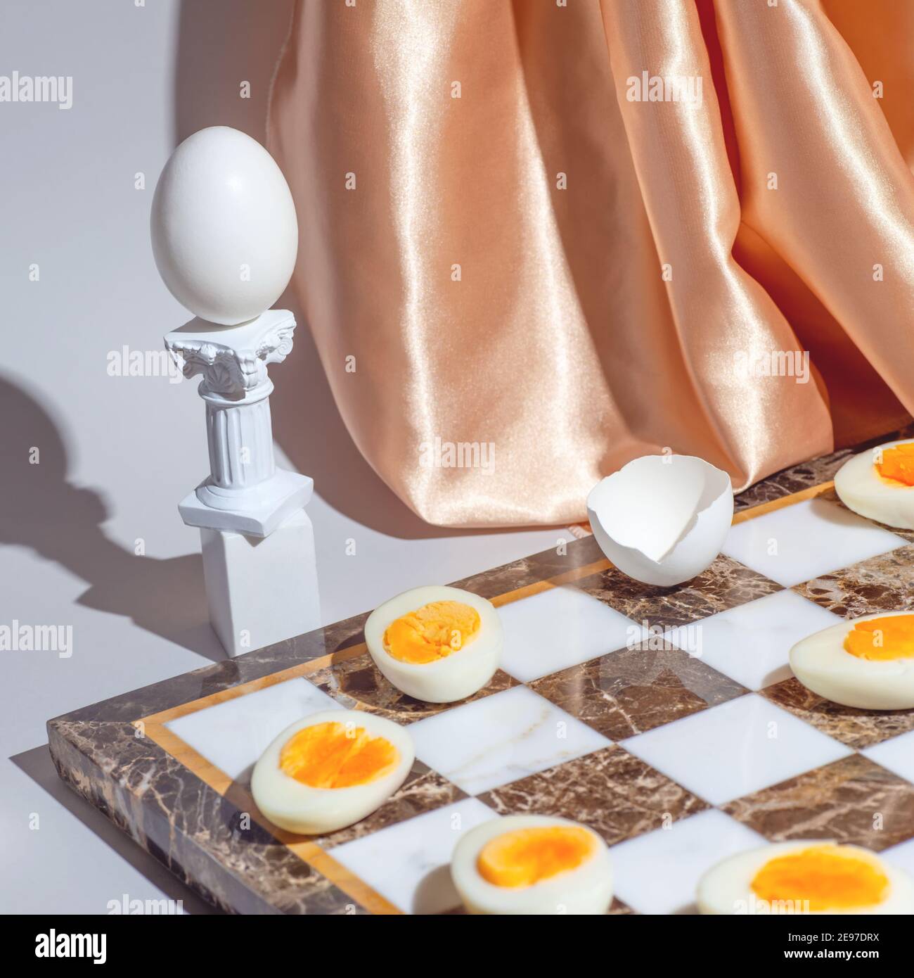 Easter chess play with fresh and boiled eggs, still life concept Stock ...