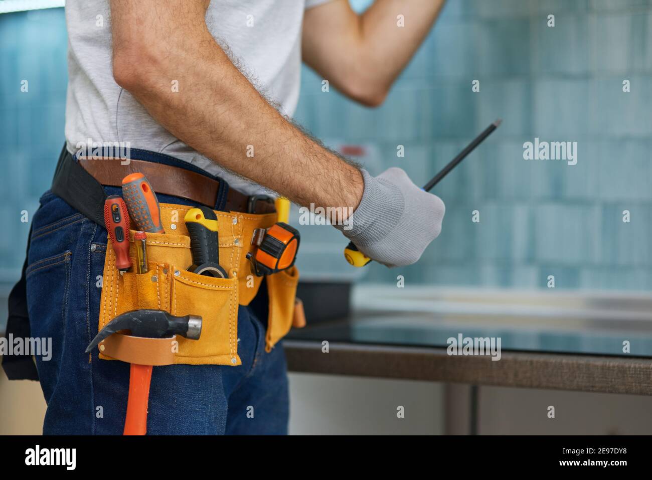 Expert. Cropped shot of young repairman, professional plumber holding a ...