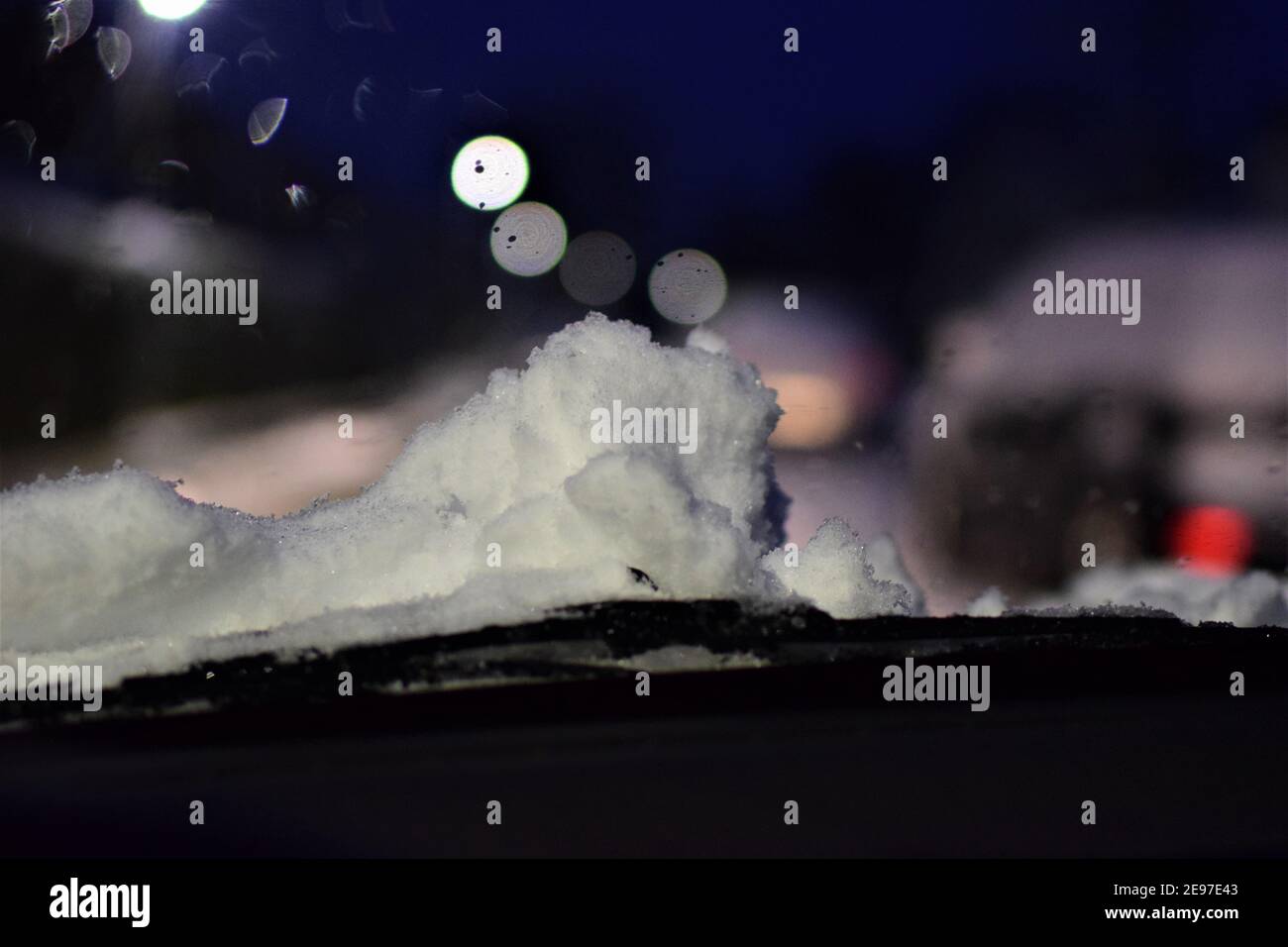 View through windshield on wintry road with snow on the hood Stock ...