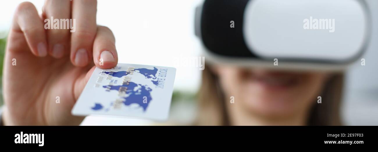 Lady showing card number Stock Photo - Alamy