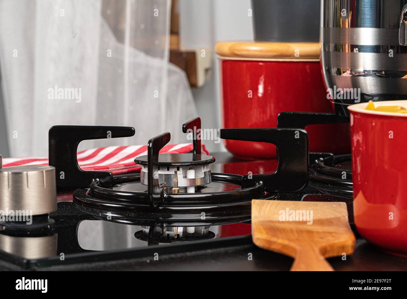 Burning gas stove burner in a kitchen Stock Photo - Alamy