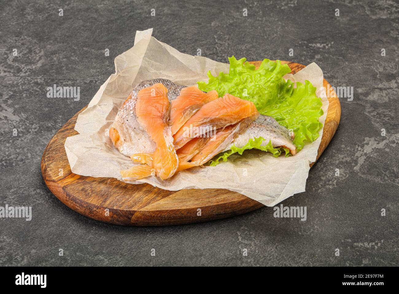 Sliced natural wild trout fillet over board Stock Photo - Alamy