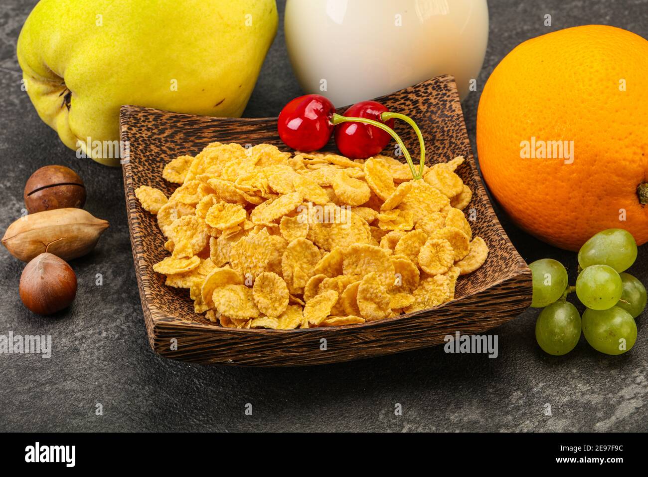 Breakfast with corn flakes, fruits and milk Stock Photo - Alamy
