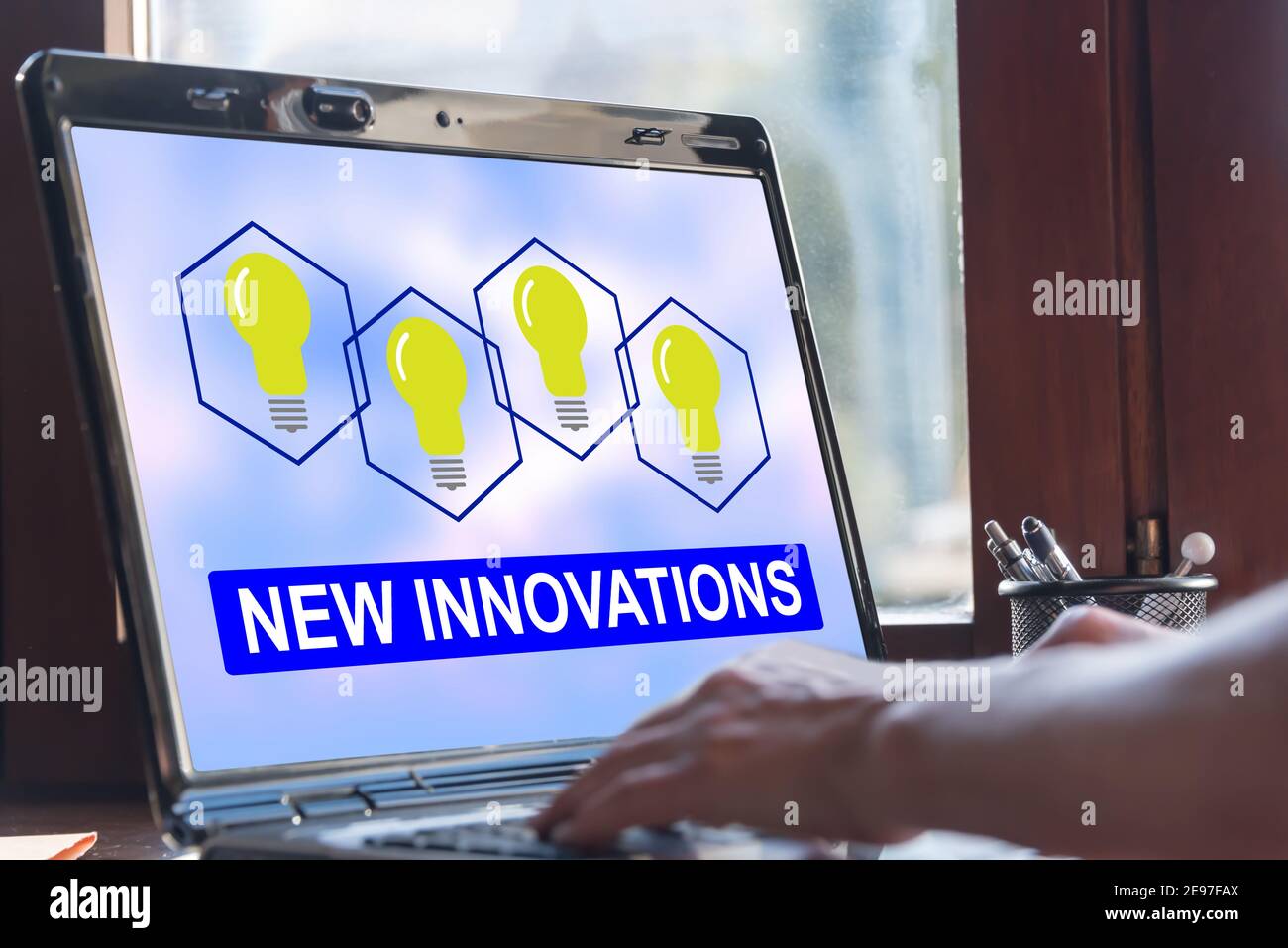 Laptop screen displaying a new innovations concept Stock Photo - Alamy