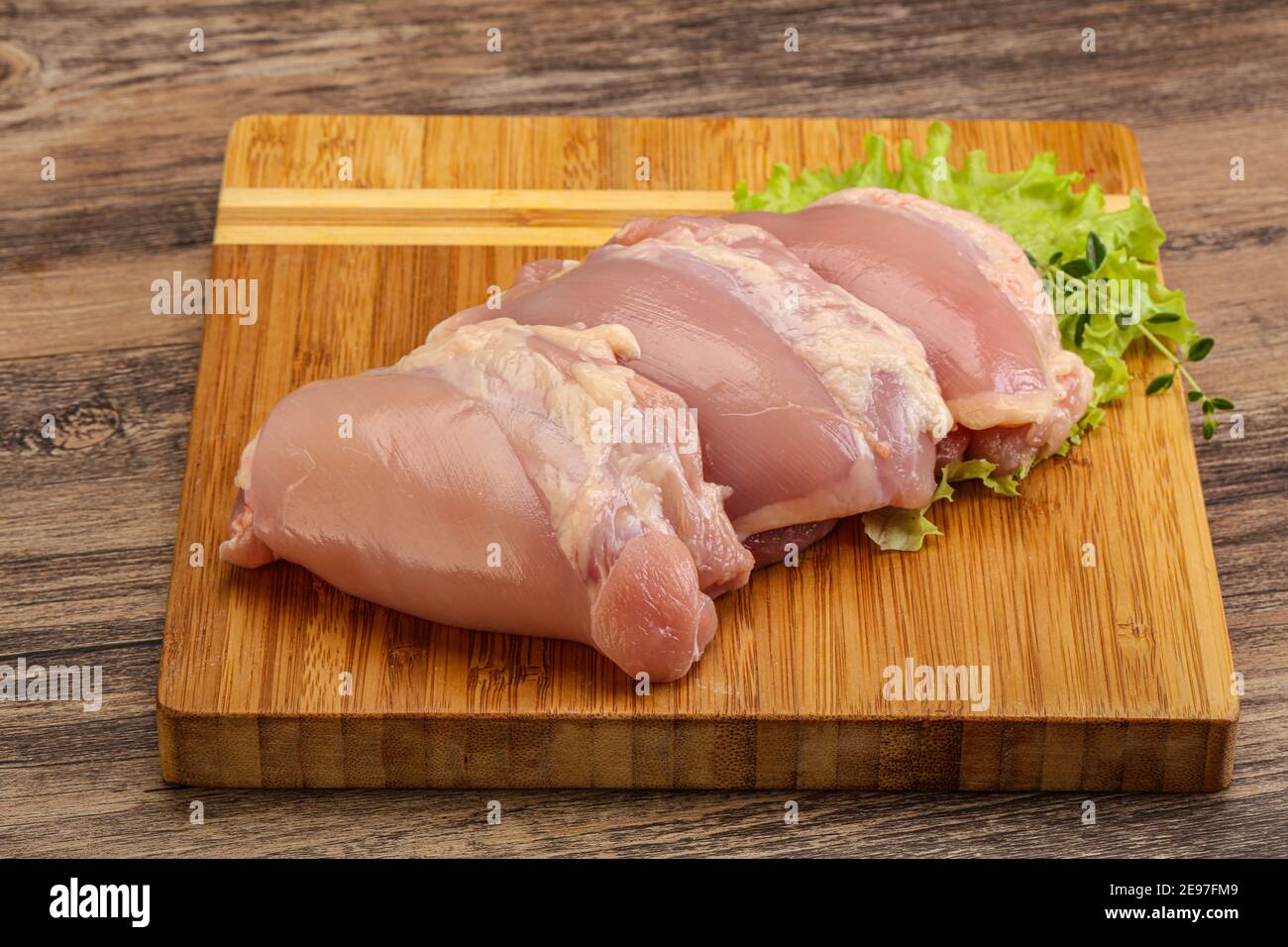 Raw chicken boneless and skinless leg for cooking Stock Photo - Alamy