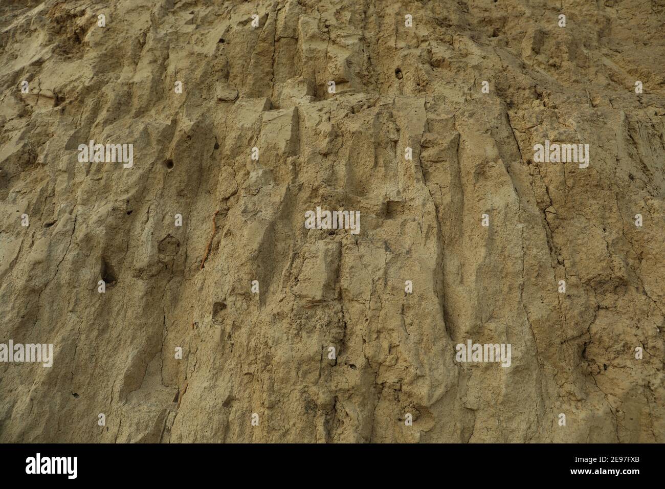 Clay soil of slope on whole background Stock Photo - Alamy