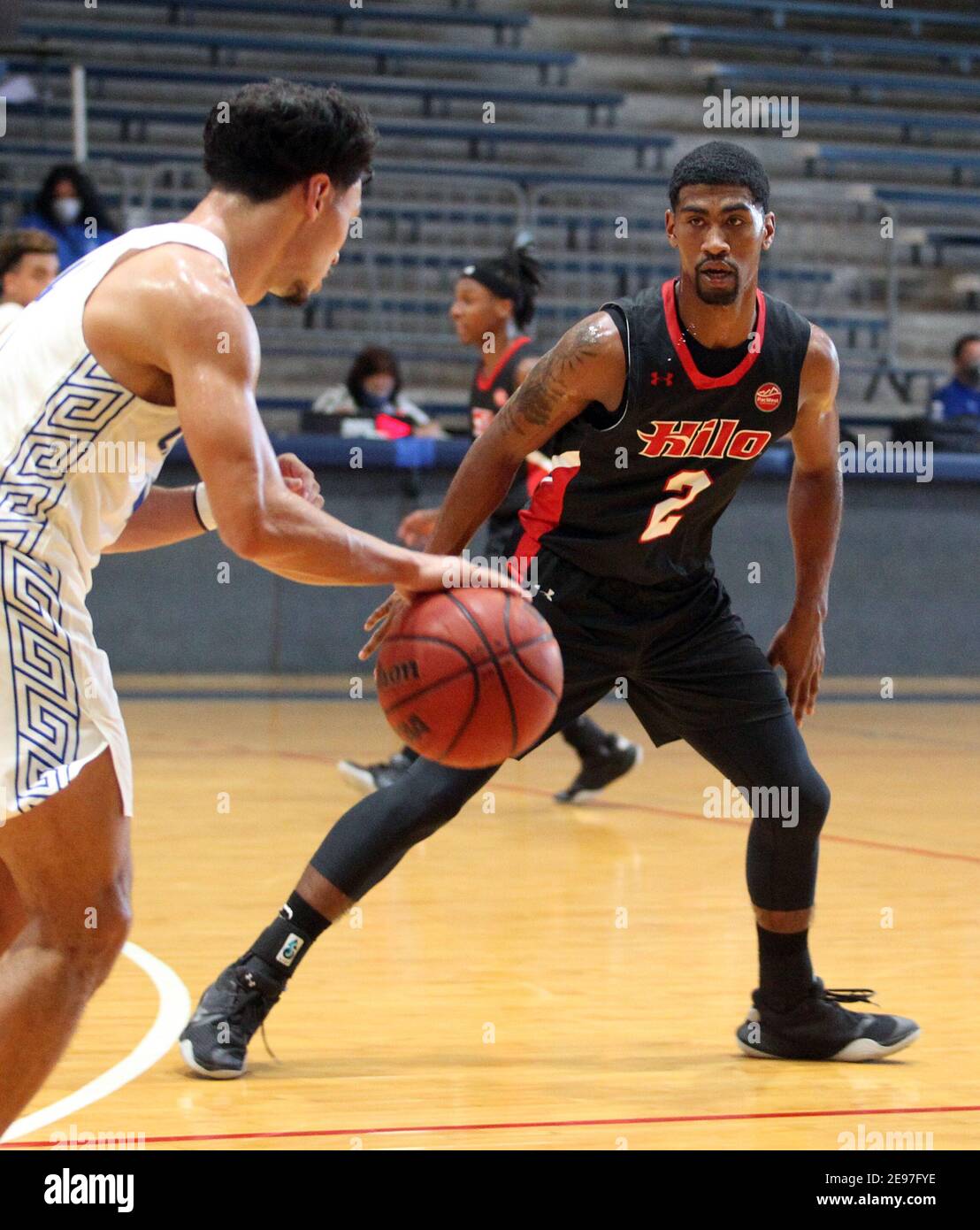 January 30, 2021 - Hawaii -Hilo Vulcans guard Jordan Graves #2 defends ...