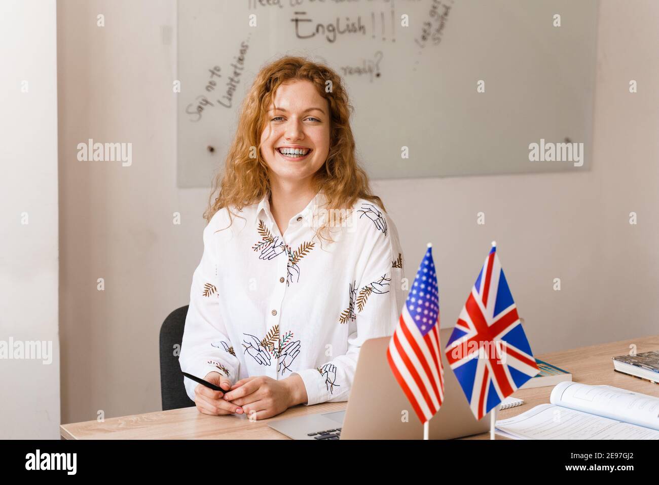 Close-up portrait of a beautiful smiling student on bright background ...