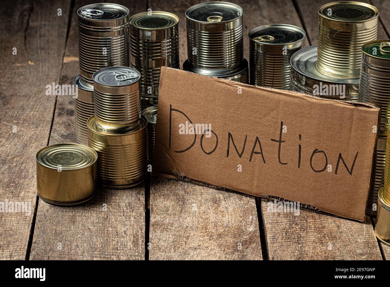Food donations on the table. Text Donation Stock Photo - Alamy