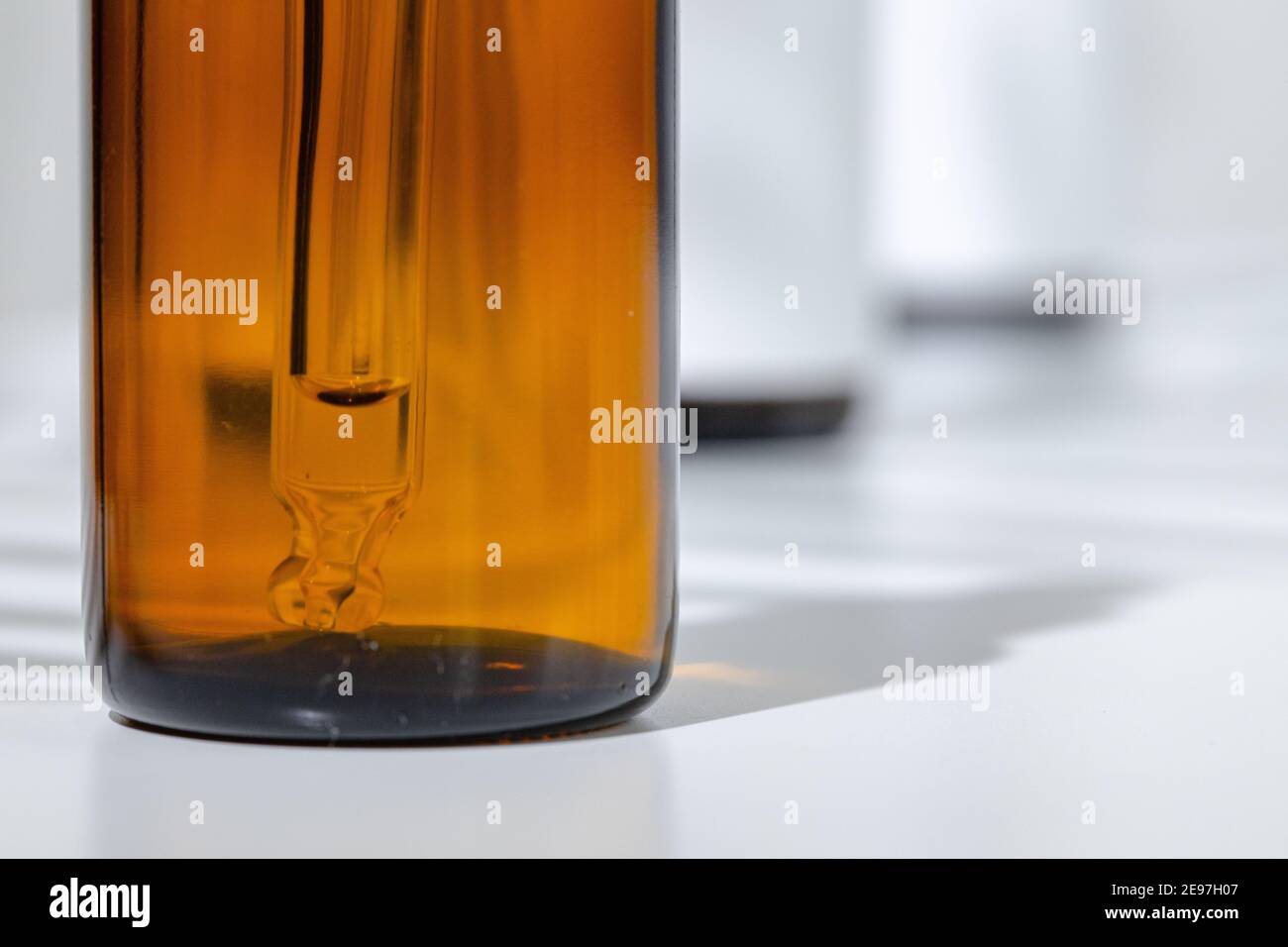 Close up photo of glass cosmetics container for oily texture Stock ...