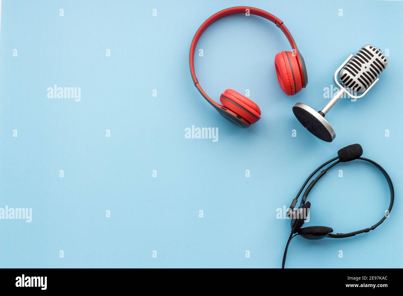 Studio microphone and headphones, top view. Recording podcast and ...