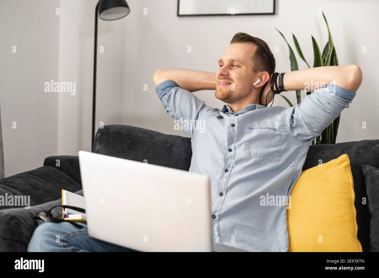 Freelancer had successful day, good deal. A guy in smart casual wear ...