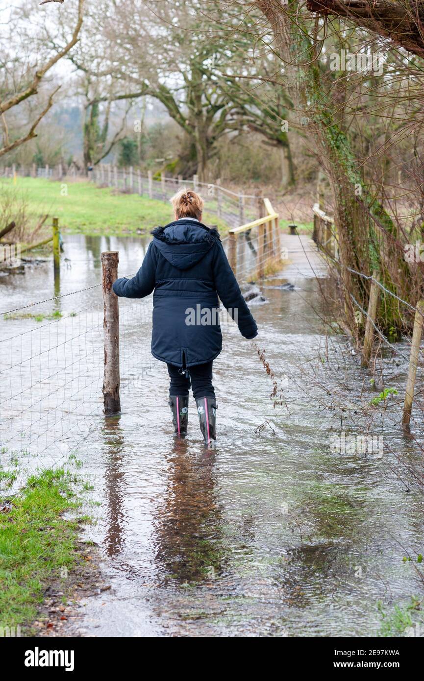 Walking through flood water hi-res stock photography and images - Alamy