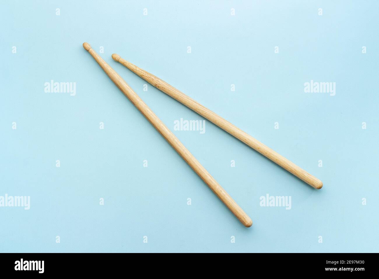 Two wooden drum sticks, top view. Music background Stock Photo - Alamy