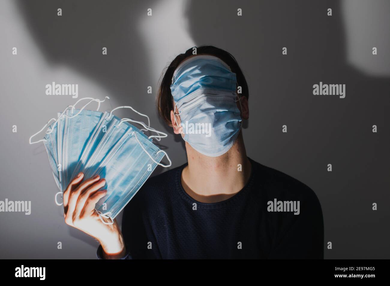 Man with masks hi-res stock photography and images - Alamy