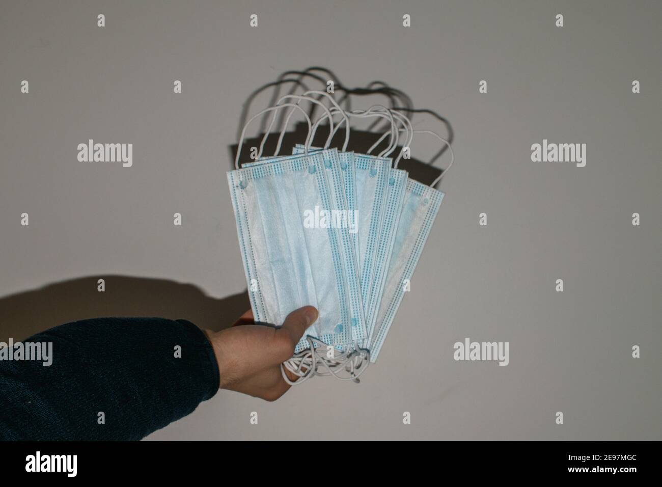 Face masks whit shadows on white background Stock Photo - Alamy
