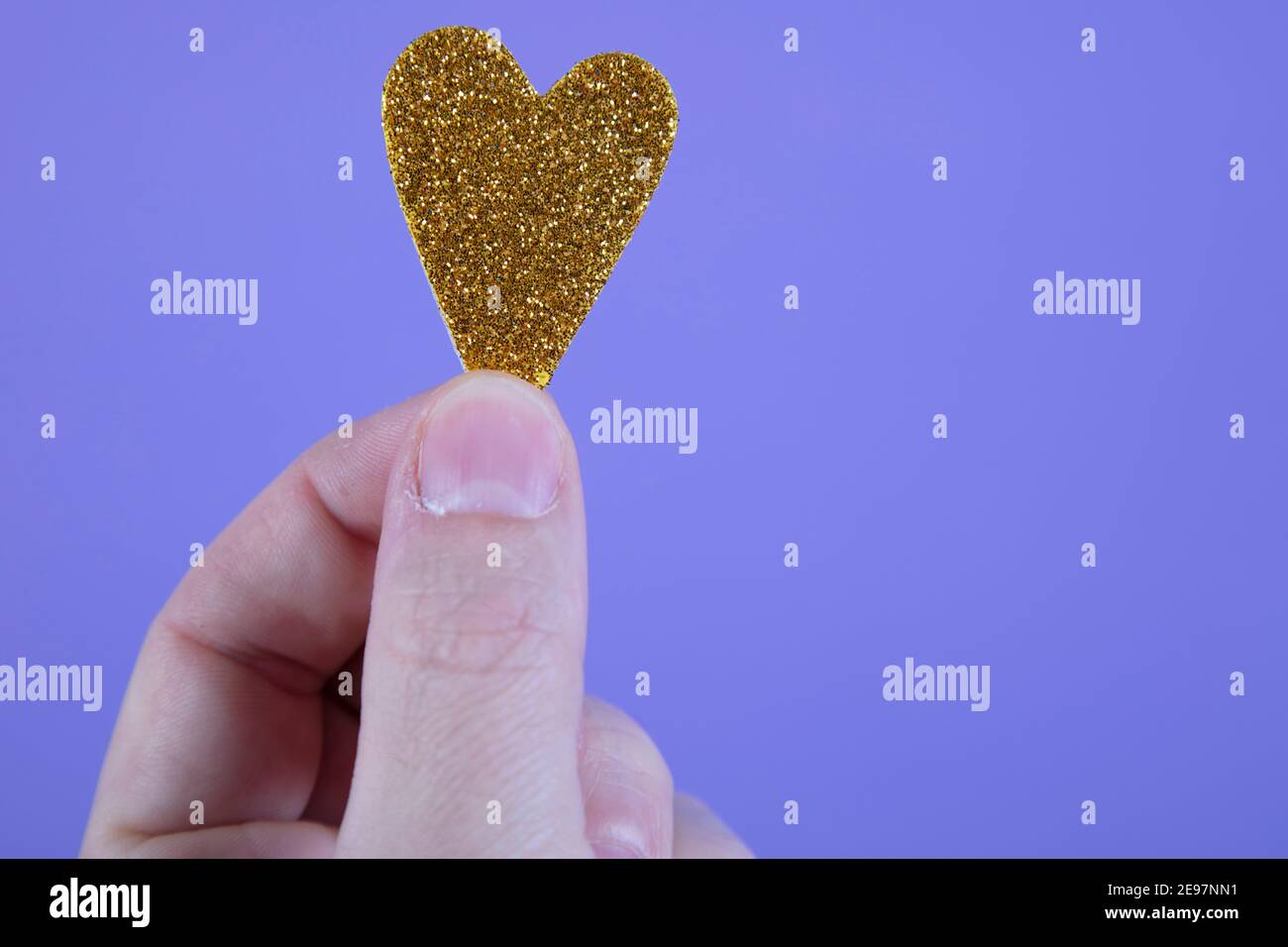 Doctor holds small red heart hi-res stock photography and images - Alamy