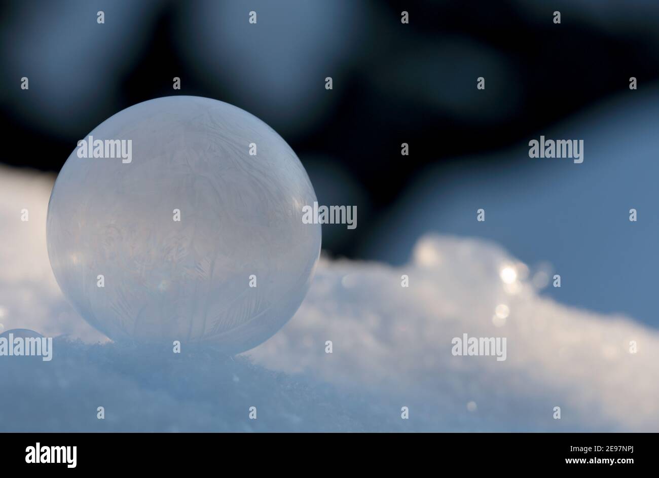 Frozen soap bubble in snow in snow on a very cold winter day Stock ...