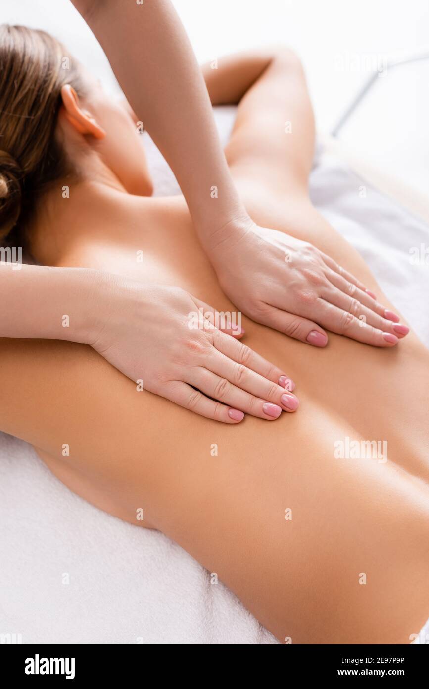Young masseur hi-res stock photography and images - Alamy