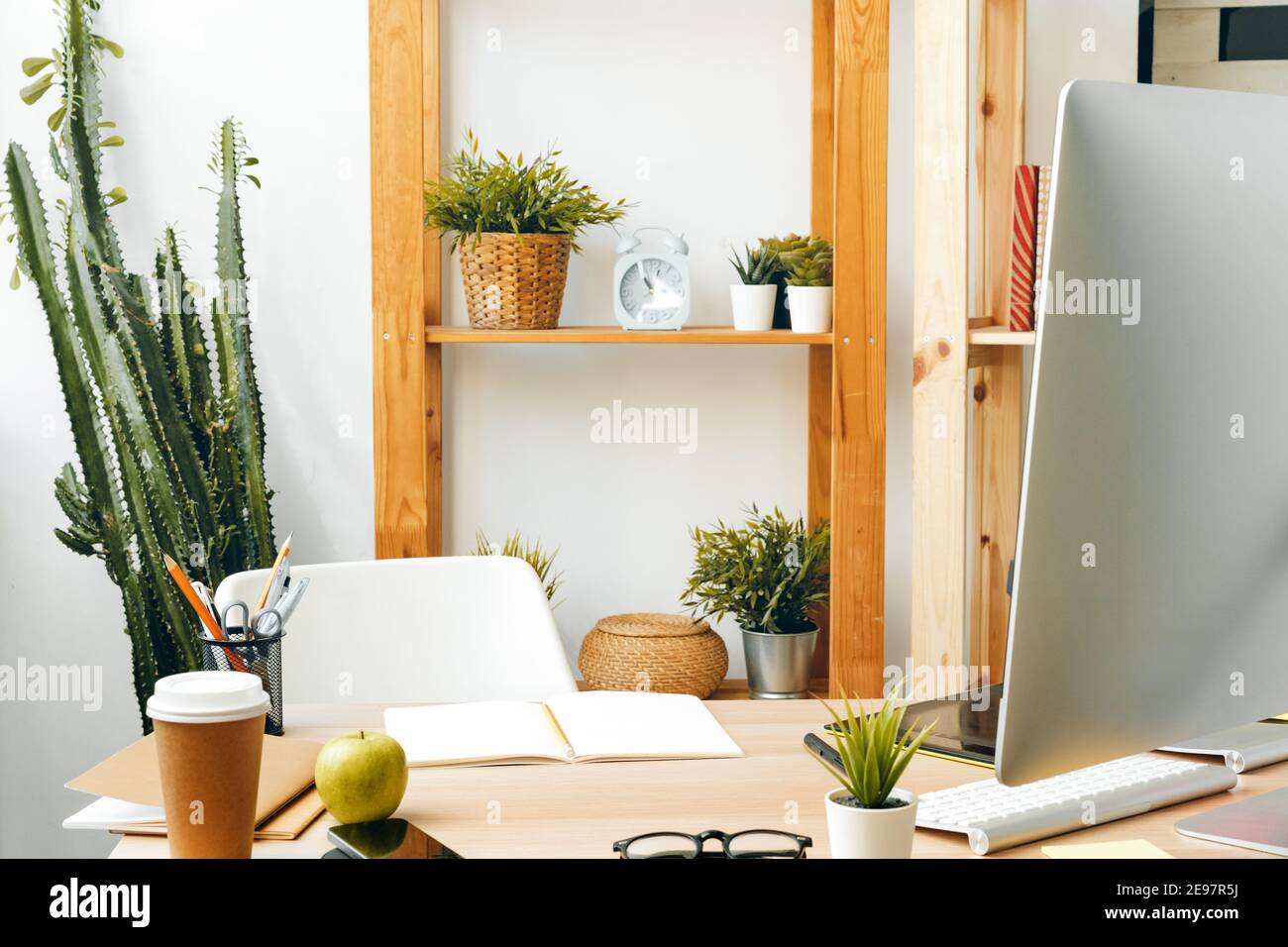 Stylish office table desk. Workspace with laptop Stock Photo - Alamy