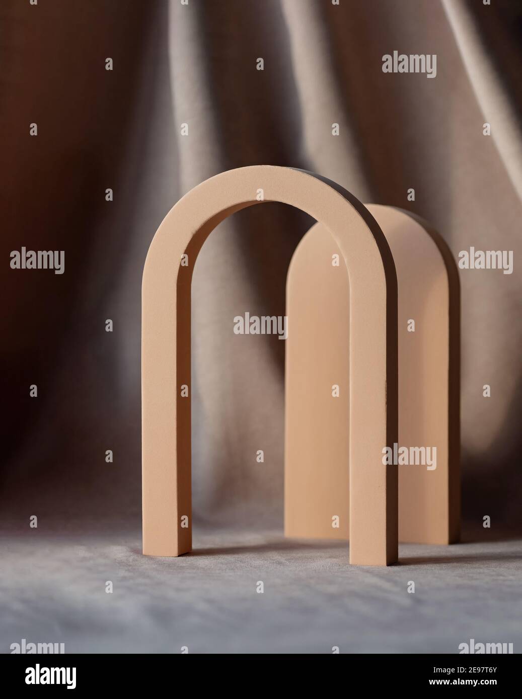 Abstract monochromatic composition with geometric figures against beige ...