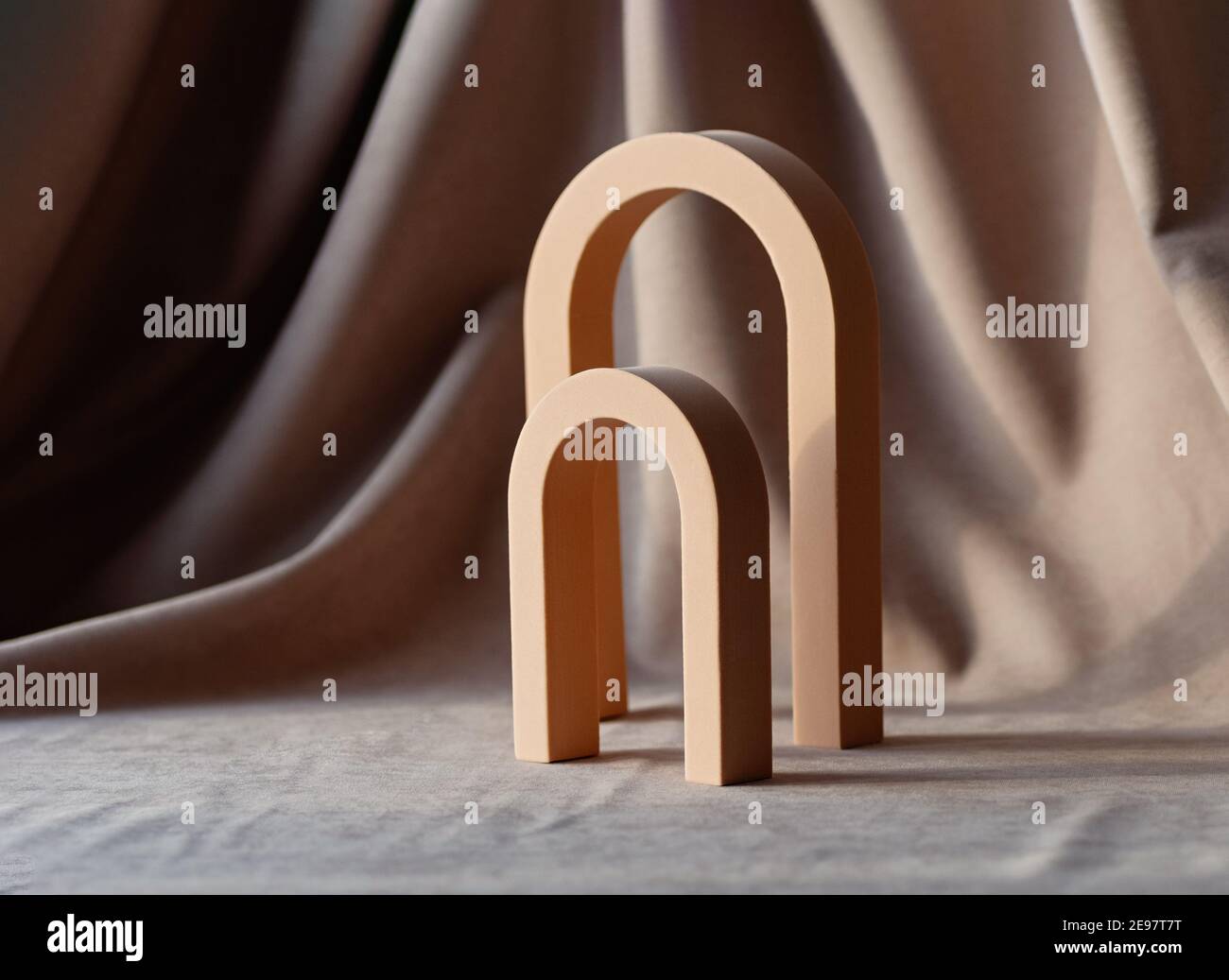 Abstract monochromatic composition with geometric figures against beige ...