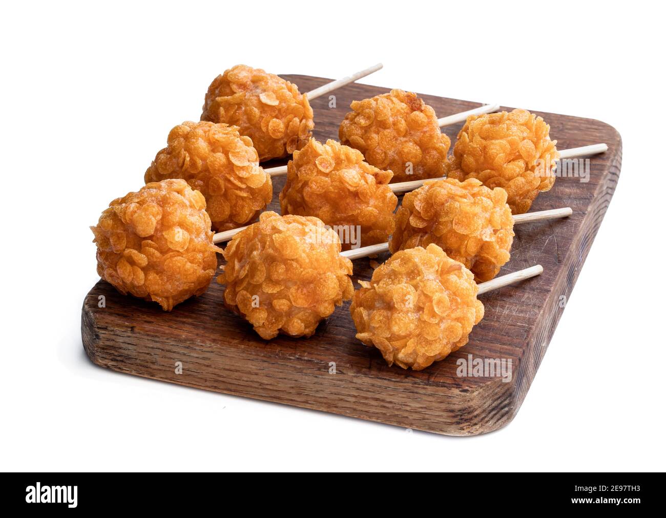 King Prawn lollipops served on wooden board isolated on white ...